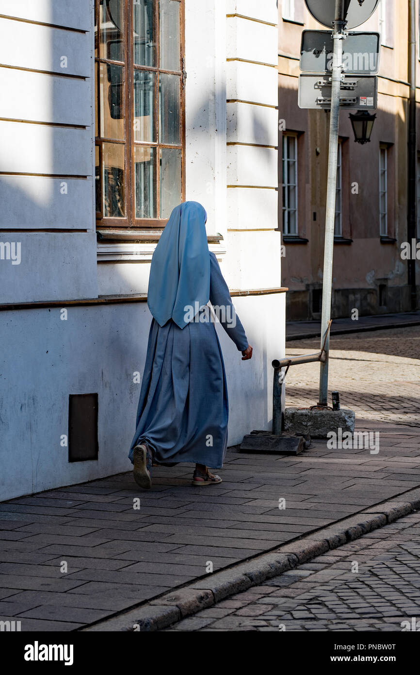 Nun walking down the street hi-res stock photography and images - Alamy
