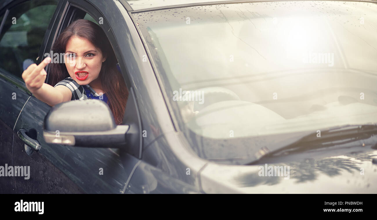 Girl driving a car bad emotions Stock Photo - Alamy