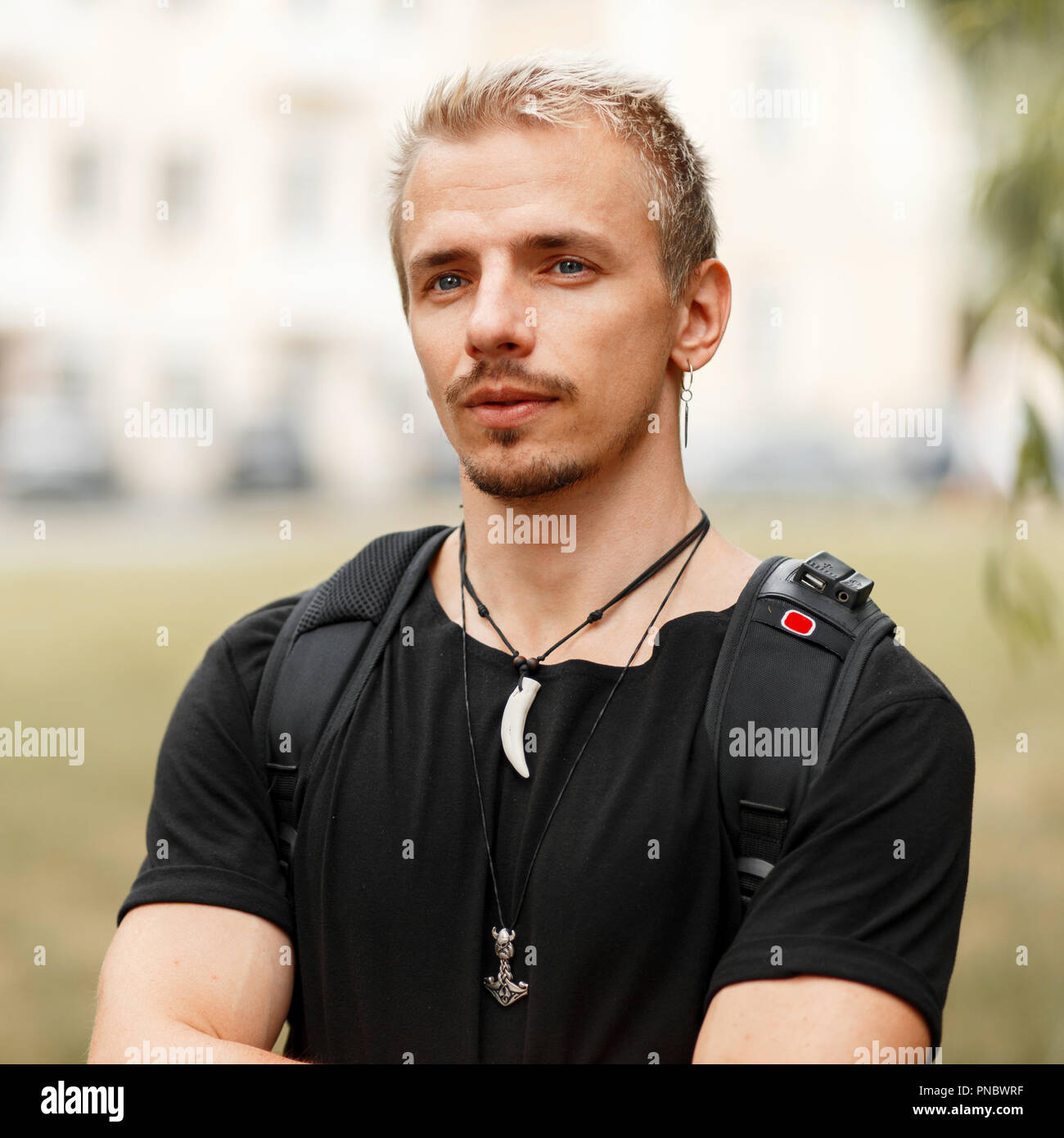 Handsome tourist in black hi-res stock photography and images - Alamy