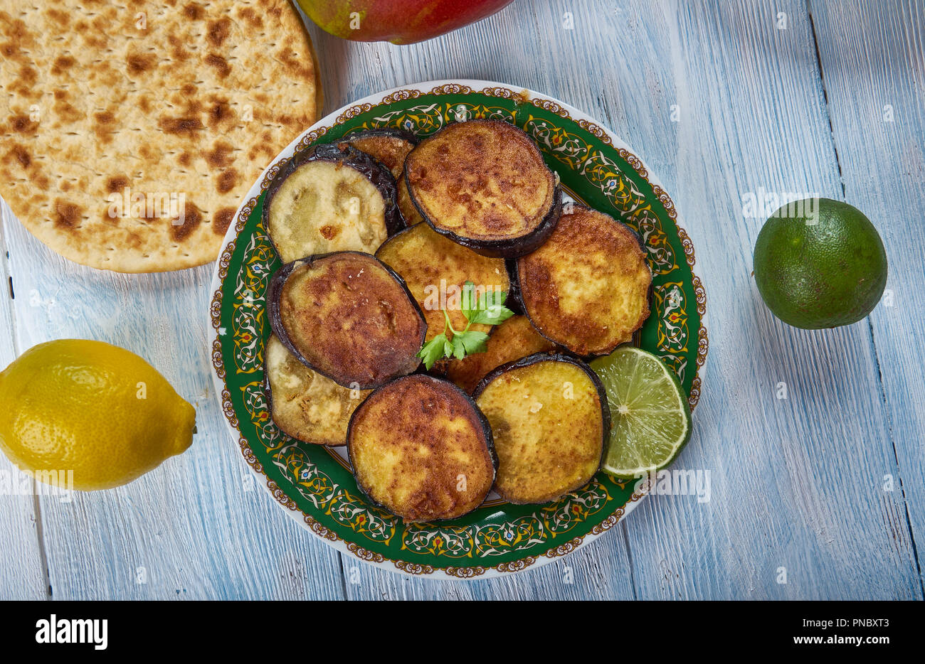 Beguni, made of eggplant which is sliced and battered , Bengali cuisine ...