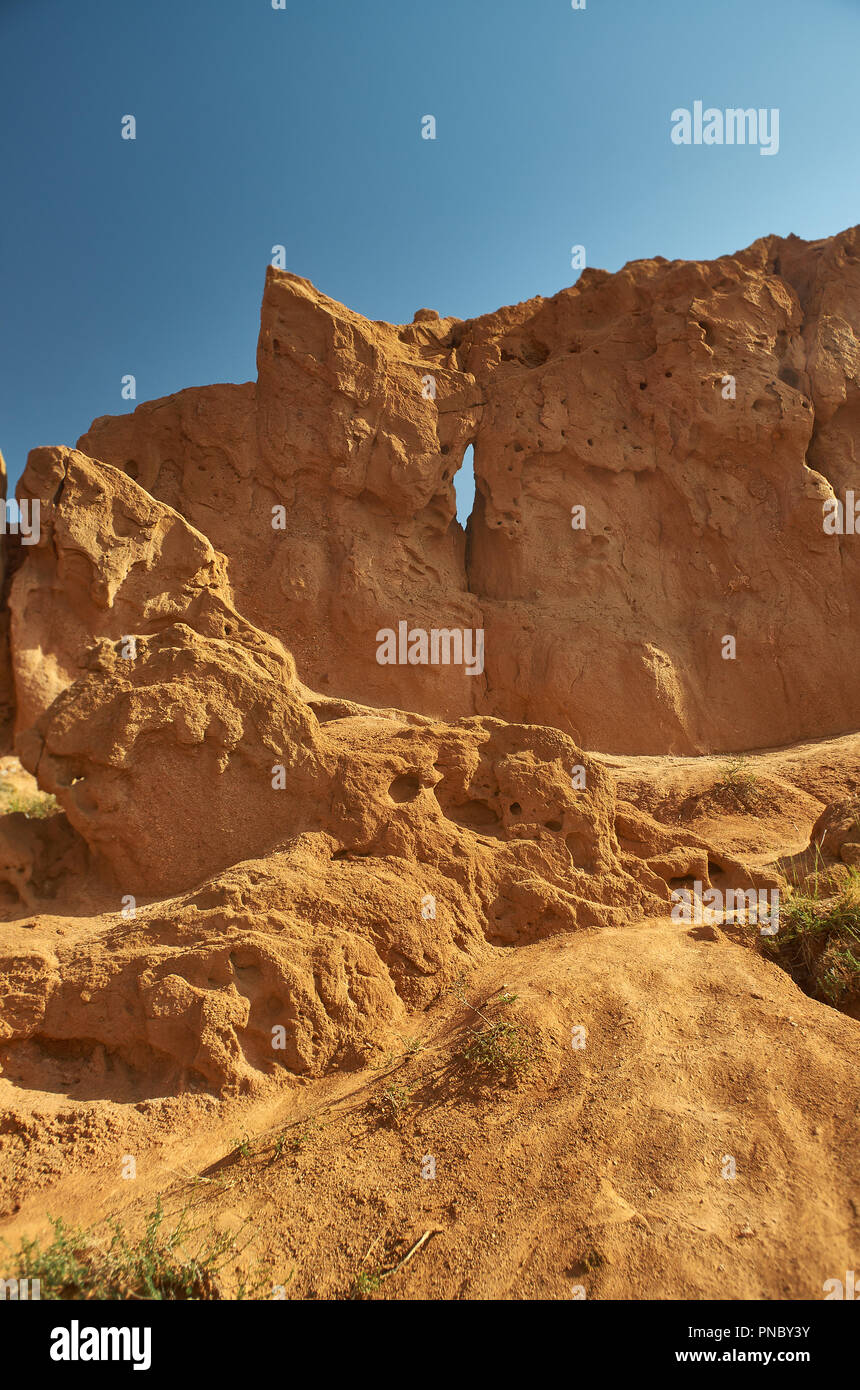 Fairy Tale Canyon, rock formations on the Issyk-Kul lake. Kyrgyzstan ...