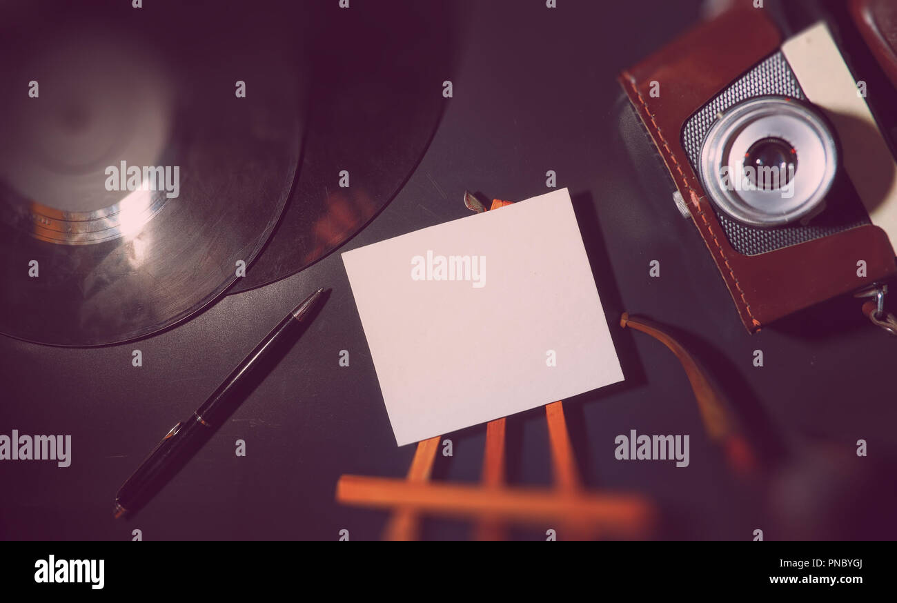 Vinyl plate and retro camera Stock Photo - Alamy