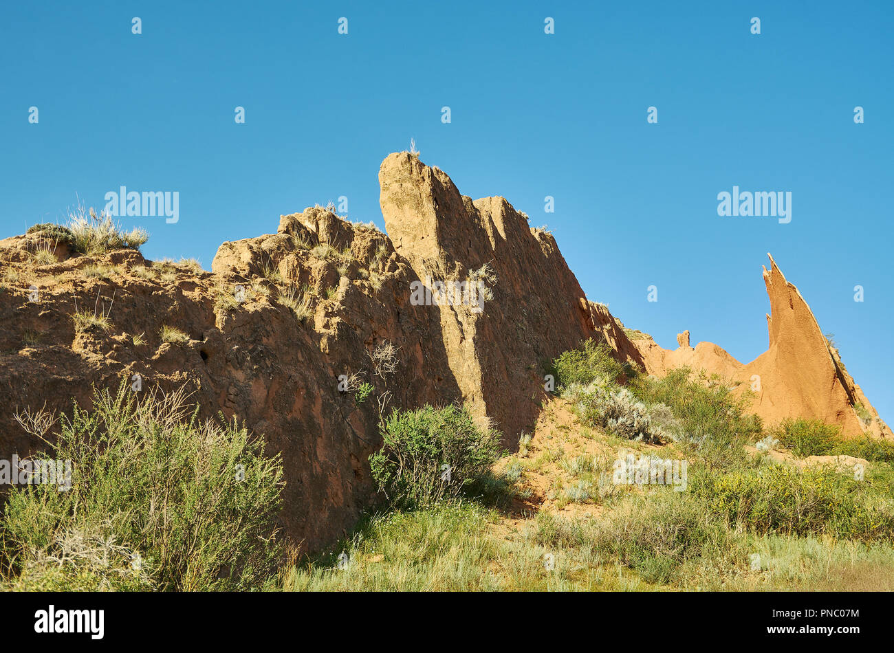 Fairy Tale Canyon, rock formations on the Issyk-Kul lake. Kyrgyzstan ...