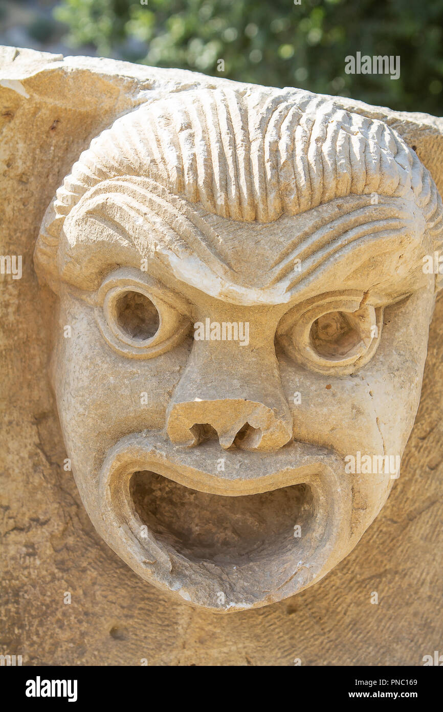 Theatrical mask relief of ancient town of Myra in the Lycia region of ...
