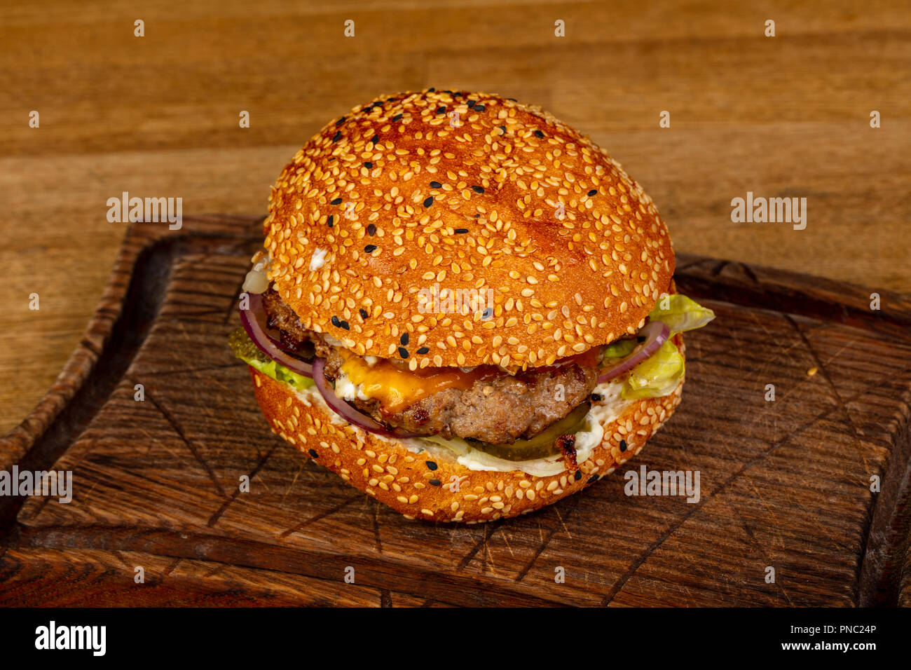 Tasty burger with meat and cheese Stock Photo - Alamy