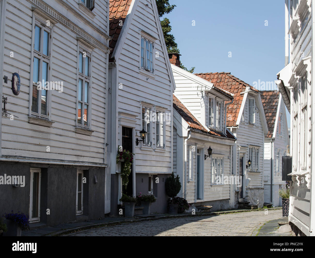 Street with white wooden houses in old centre of Stavanger - Norway ...
