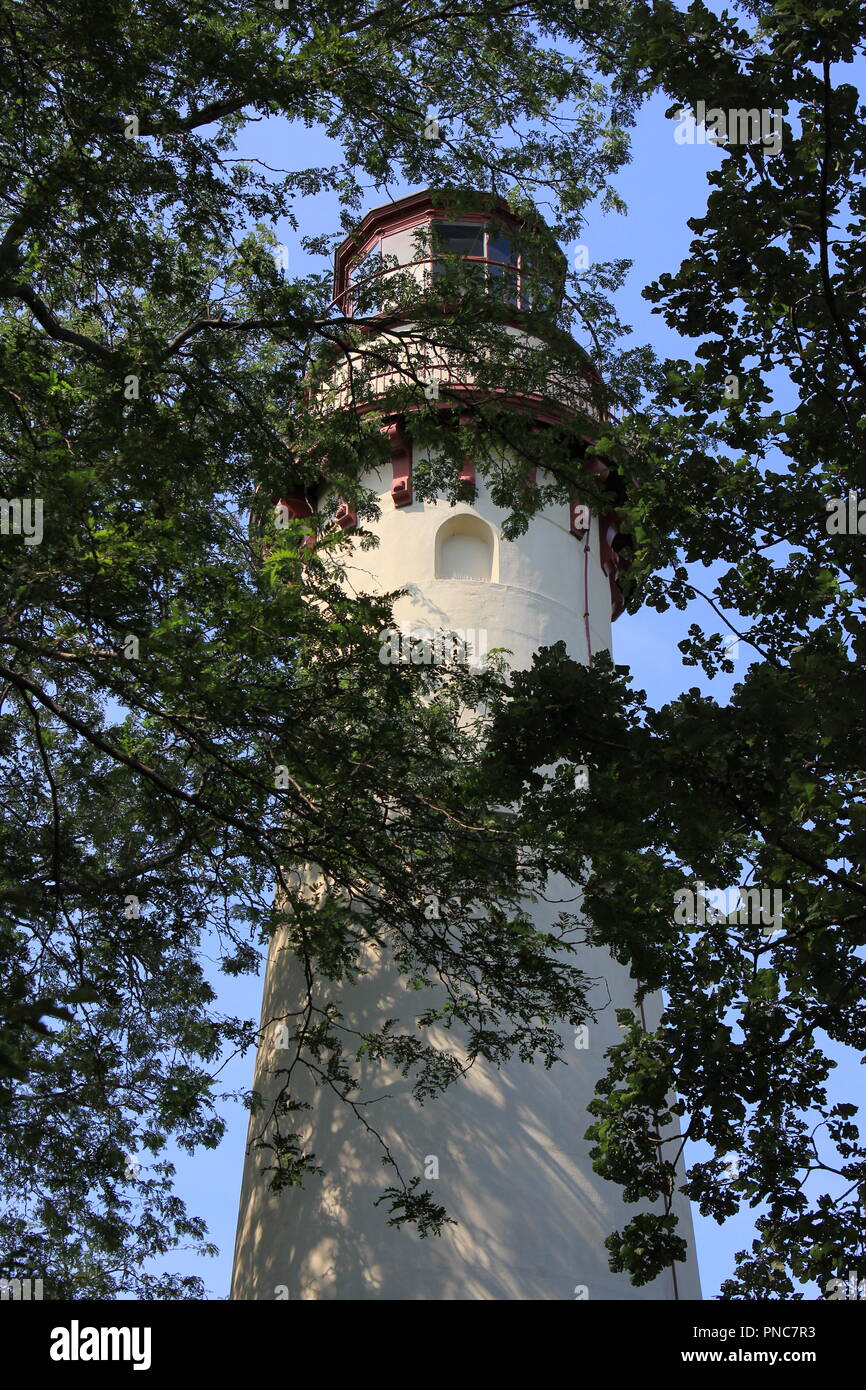 Beautiful lighthouse tower standing against the blue summer sky Stock ...
