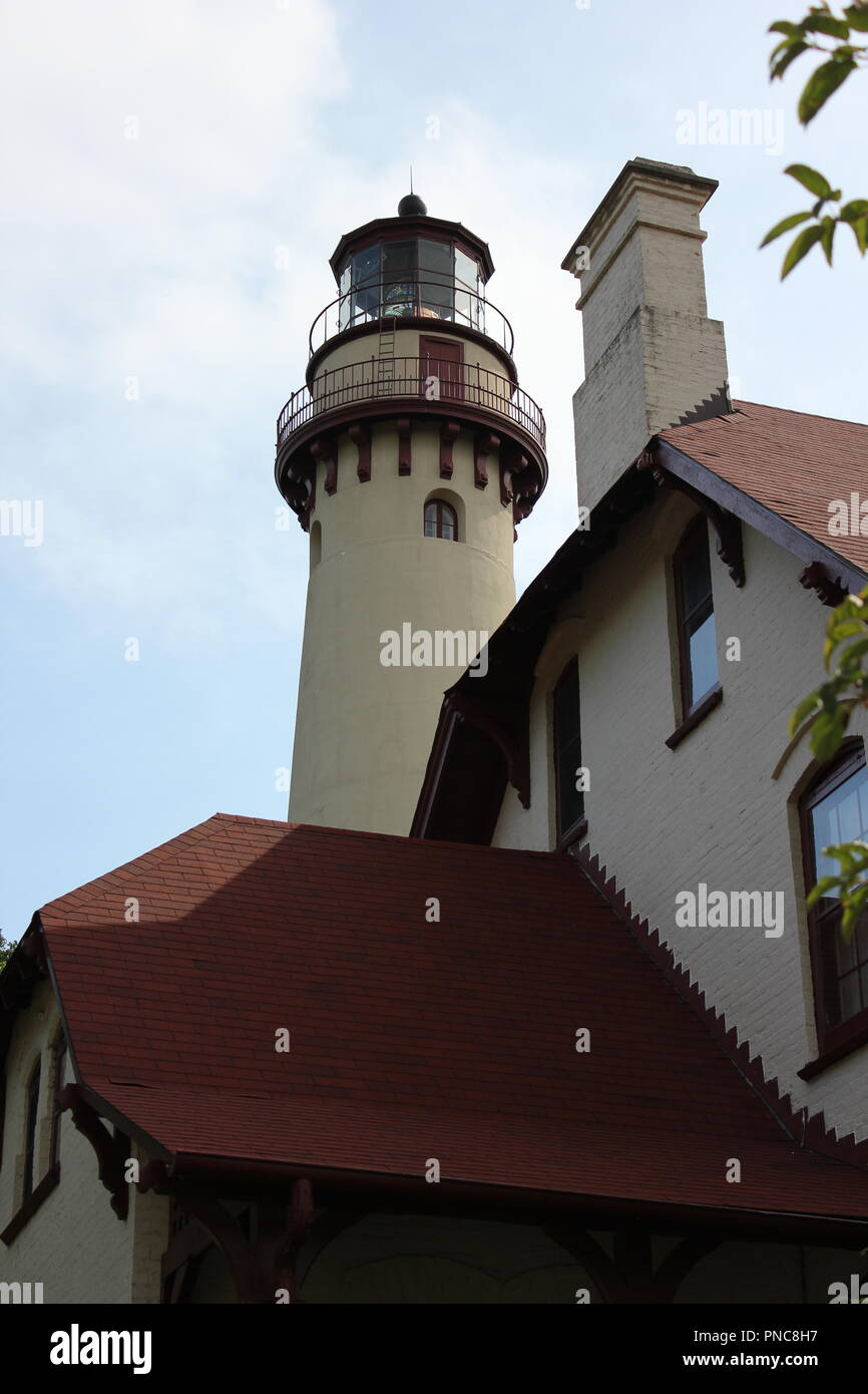 Beautiful lighthouse tower standing against the blue summer sky Stock ...