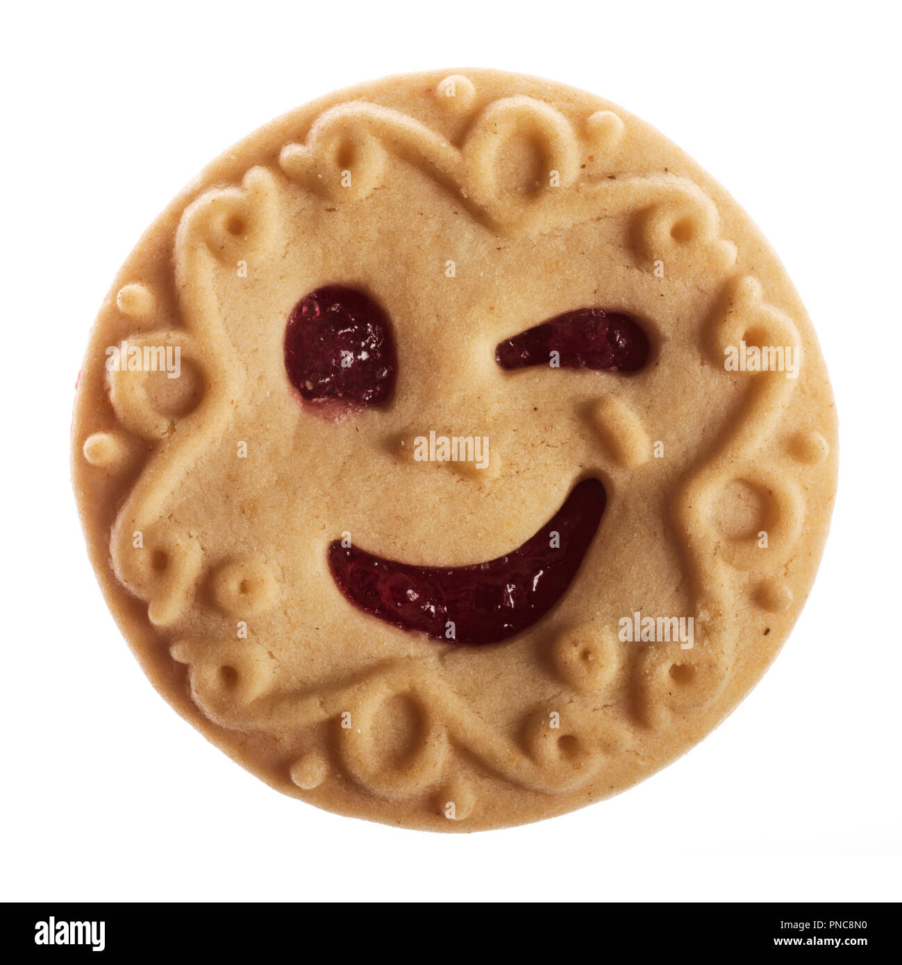 smiling cookie wink one eye filled with jam, isolated on white ...