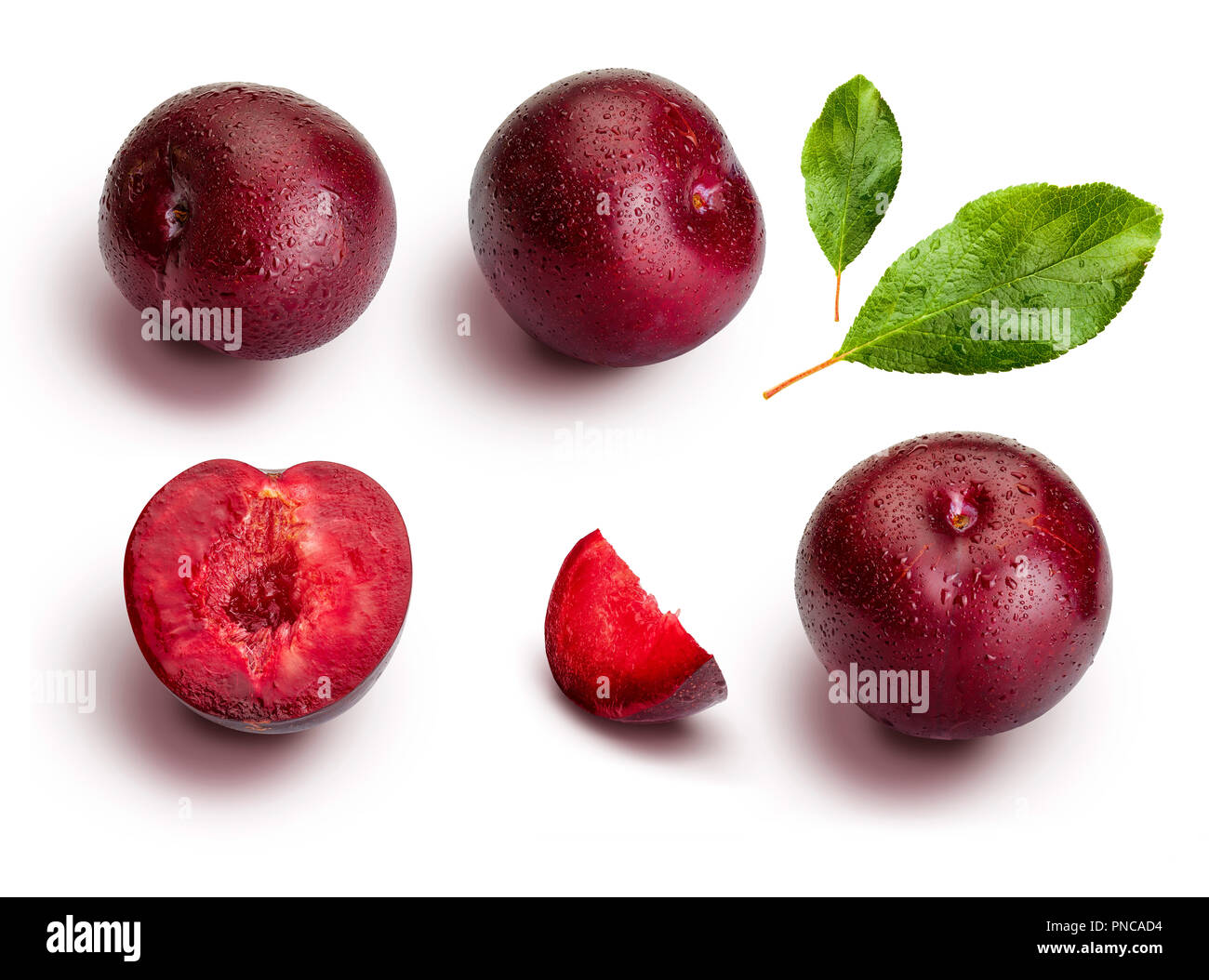 Plums from different angles and leaves isolated on white background ...