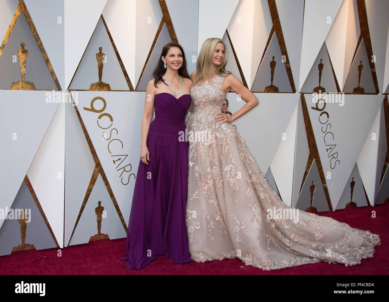Ashley Judd and Mira Sorvino arrive on the red carpet of The 90th ...