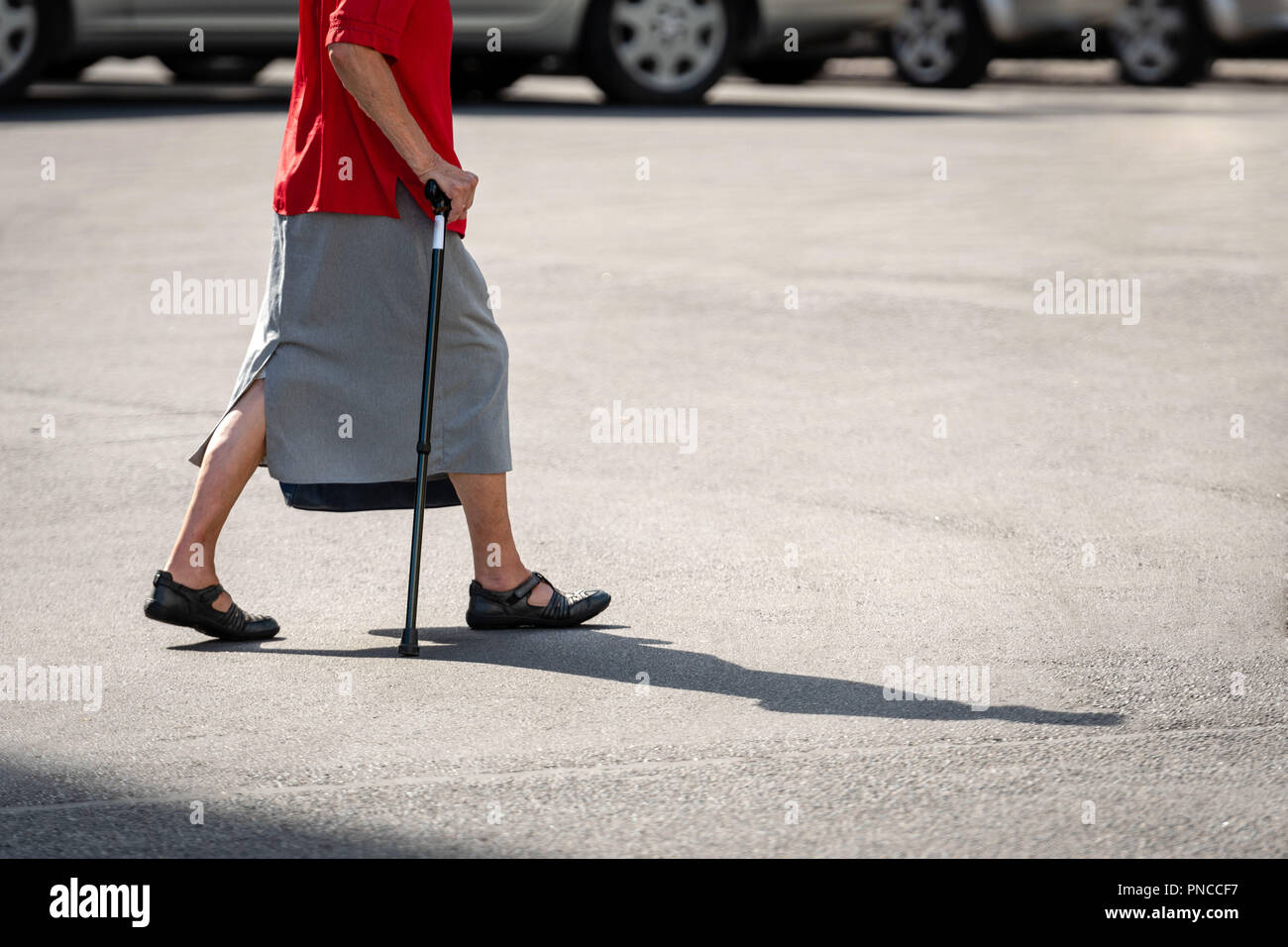Old lady walking stick on hi-res stock photography and images - Alamy