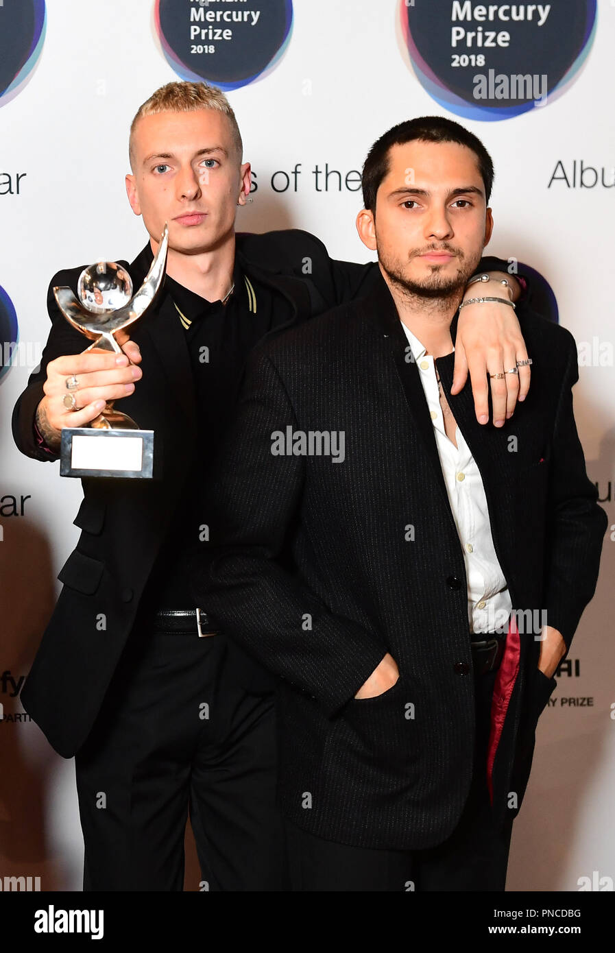 Theo Ellis and Joel Amey of Wolf Alice celebrate winning the 2018 ...