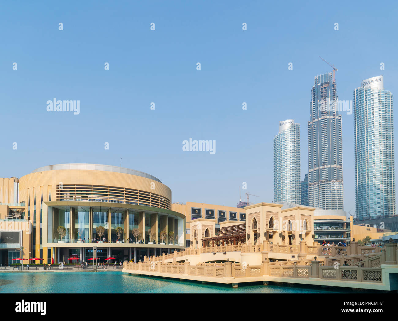 Exterior of the Dubai Mall with new high rise apartment towers under ...