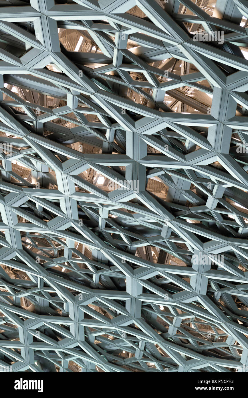 Detail of steel roof dome steelwork pattern of the Louvre Abu Dhabi at ...
