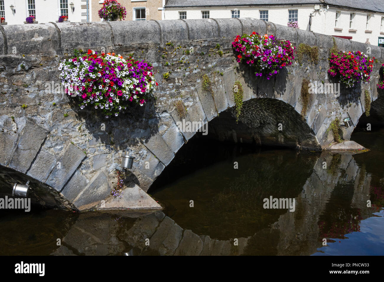 A bridge over the Carrowbeg River in the town of Westport, County Mayo ...