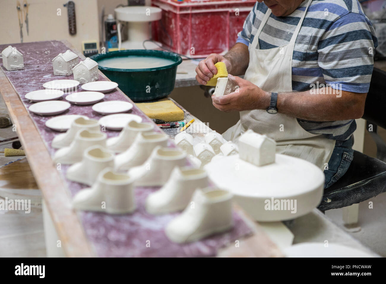Belleek, Northern Ireland - August 22nd 2018: A craftsman working on ...