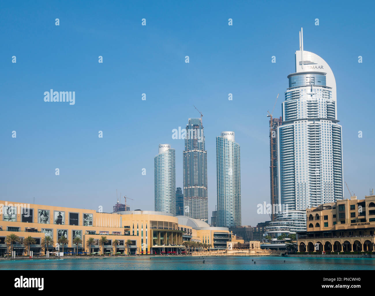 View of Dubai Mall, and new apartment buildings under construction to ...