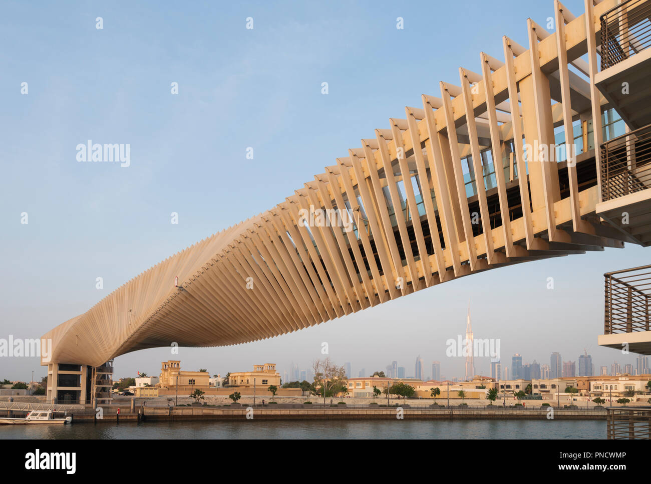 View of footbridge crossing new Dubai Water Canal a waterway that ...