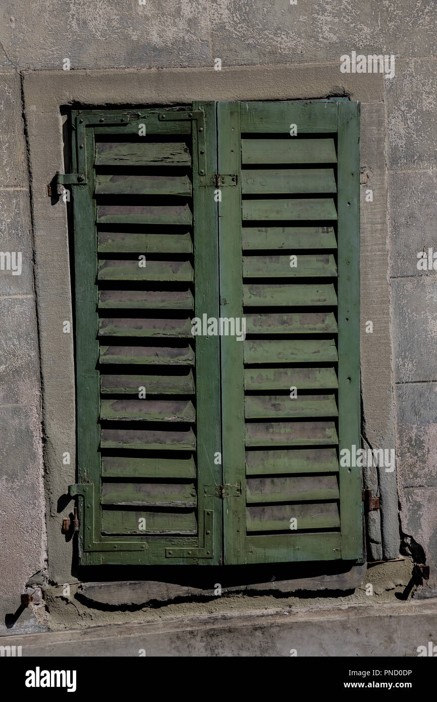 Old green blinds hi-res stock photography and images - Alamy