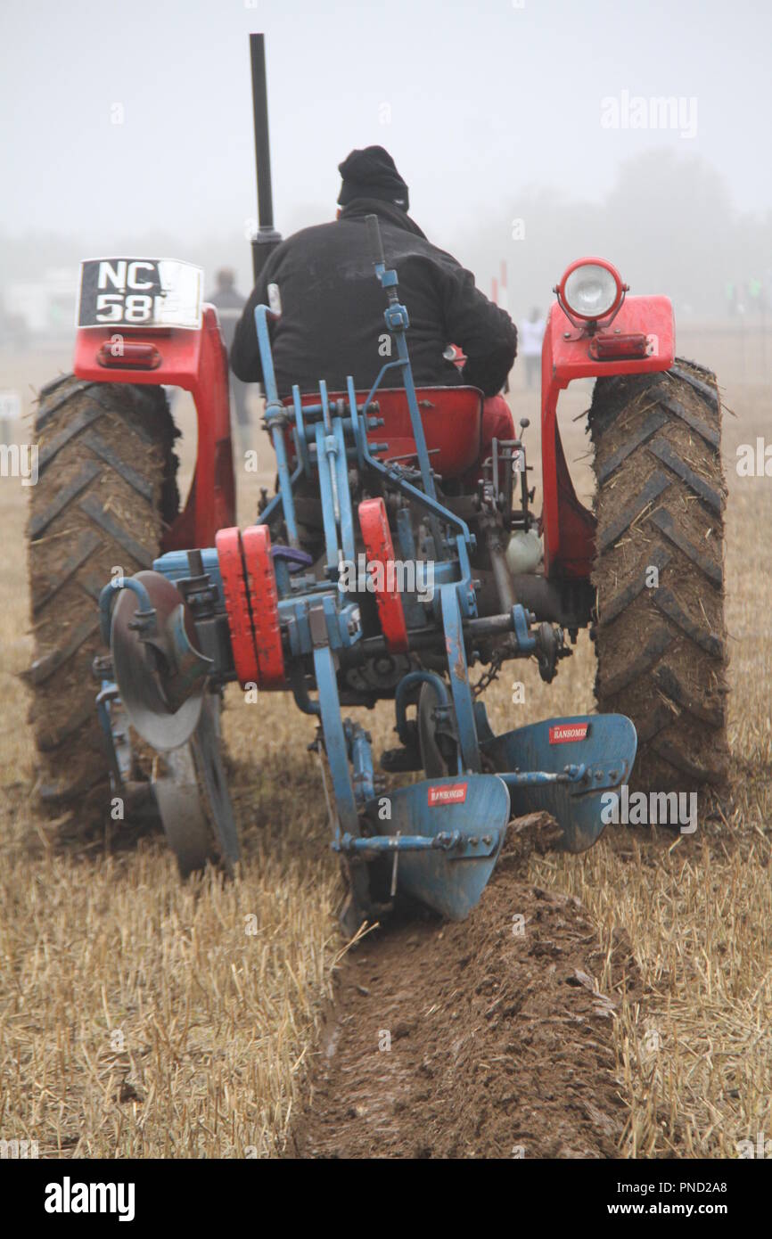 Traditional ploughing farrow old tractor Stock Photo - Alamy