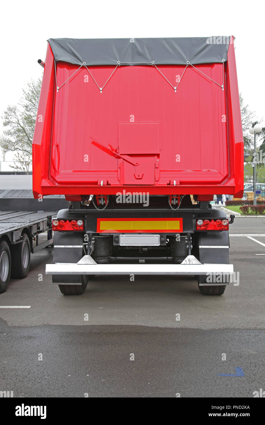 Red Semi Trailer For Bulk Cargo Transport Stock Photo - Alamy