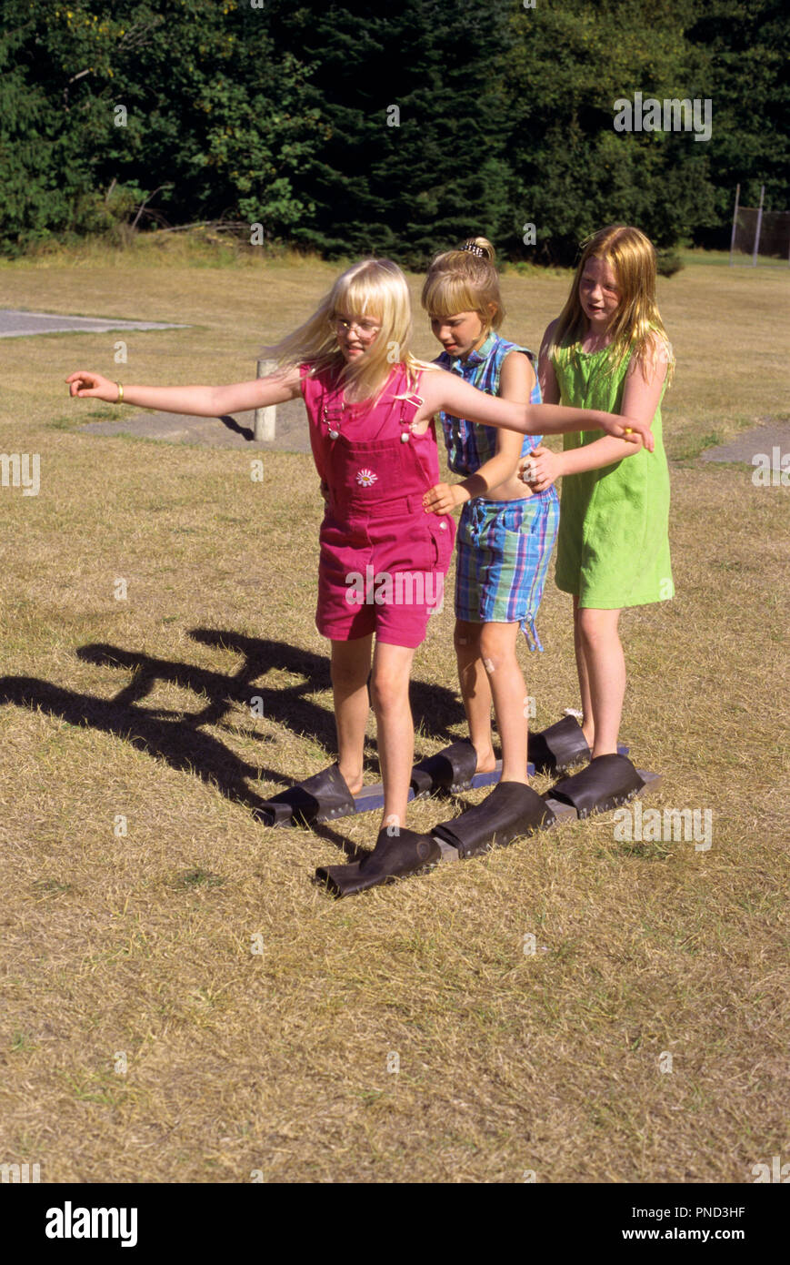 1990s THREE GIRLS IN THREE LEGGED RELAY GAME - kj13756 LGA001 HARS ...