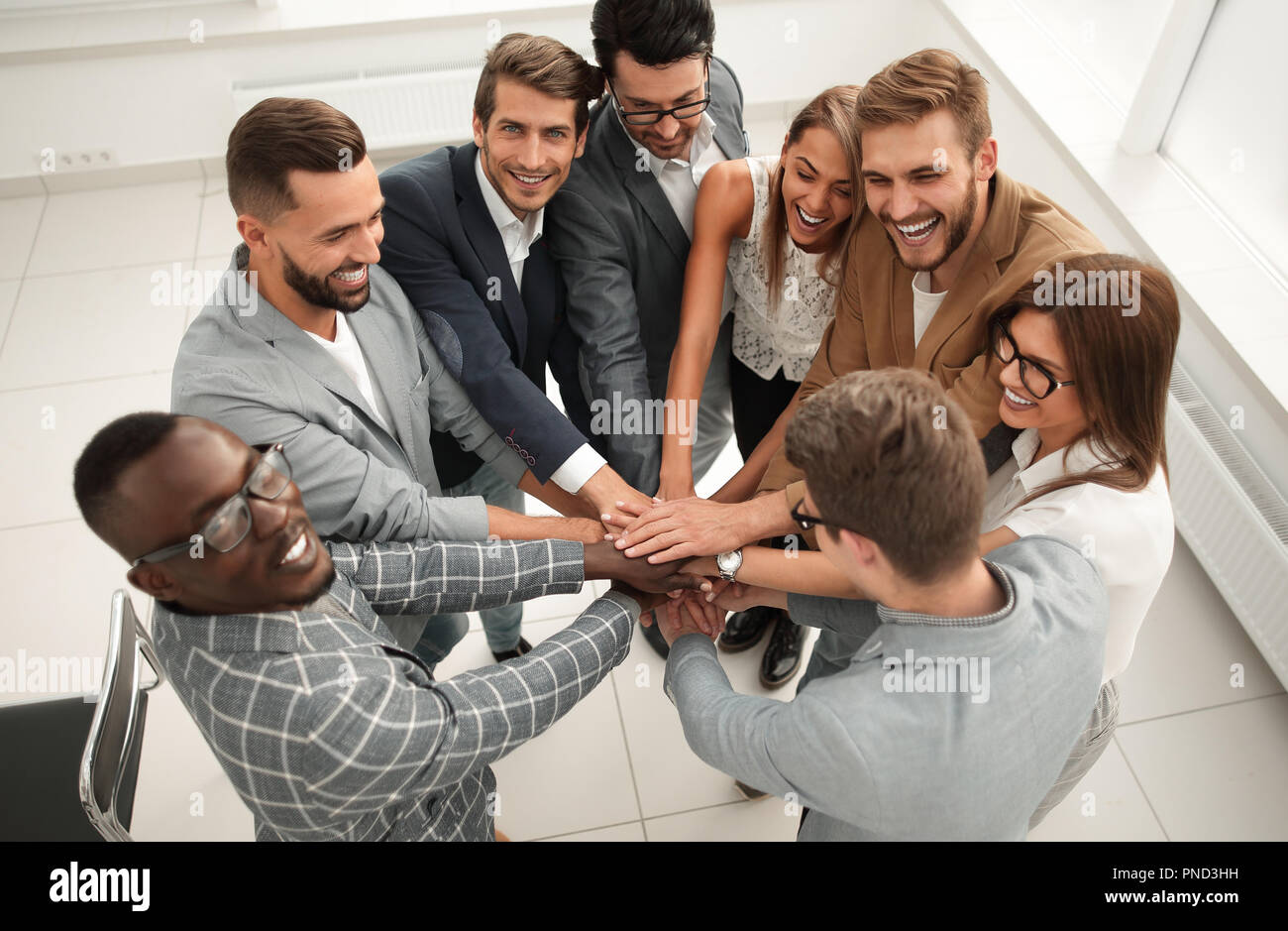 close up.modern business team standing in a circle Stock Photo - Alamy