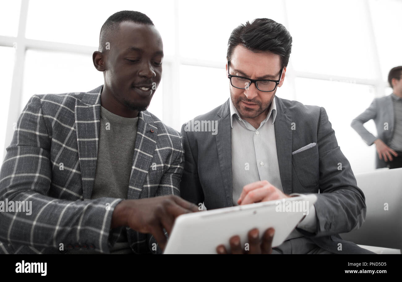 Working colleagues check data teamwork hi-res stock photography and ...
