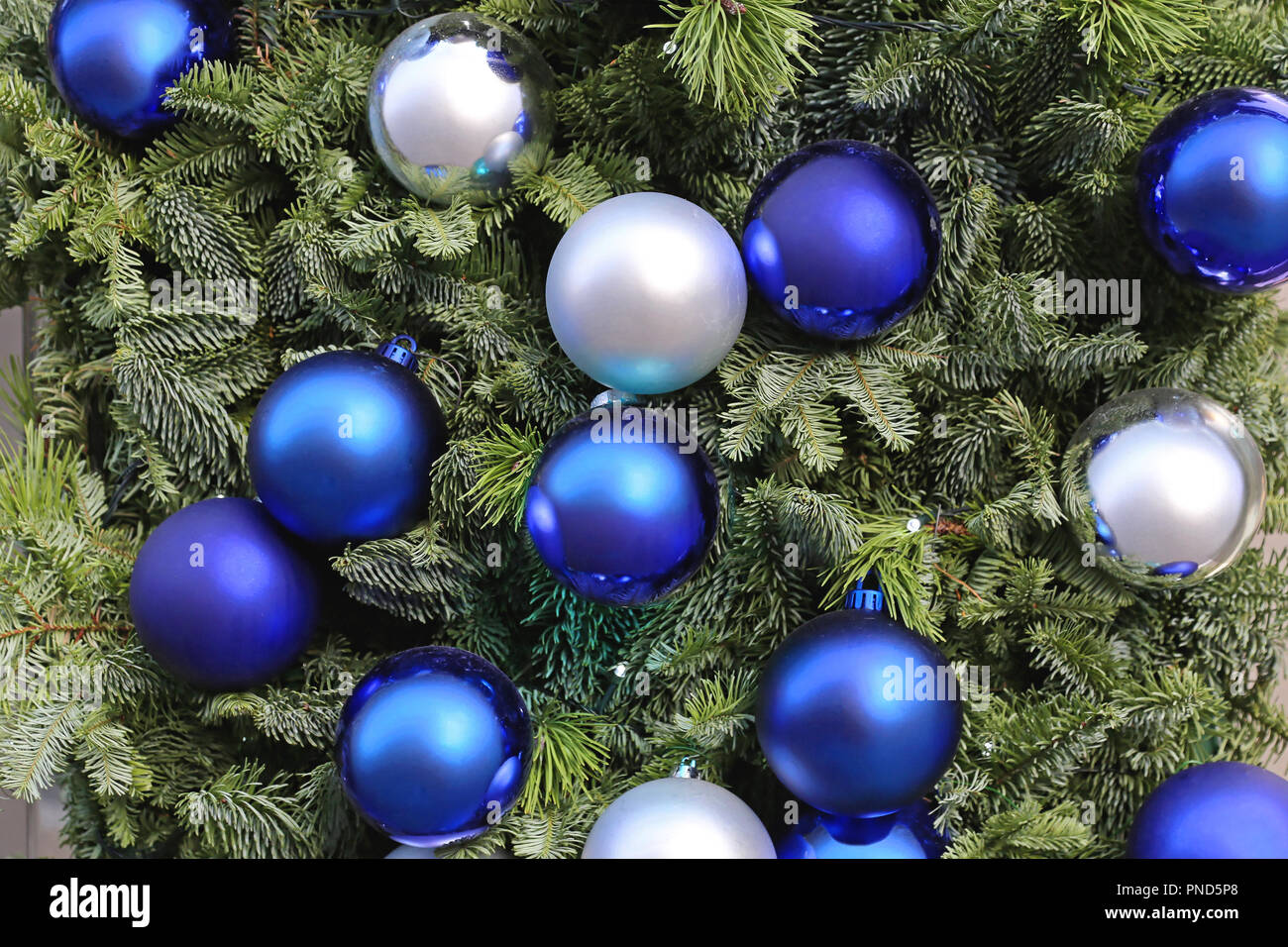 Christmas Tree With Blue Glass Bauble Ornaments Stock Photo - Alamy