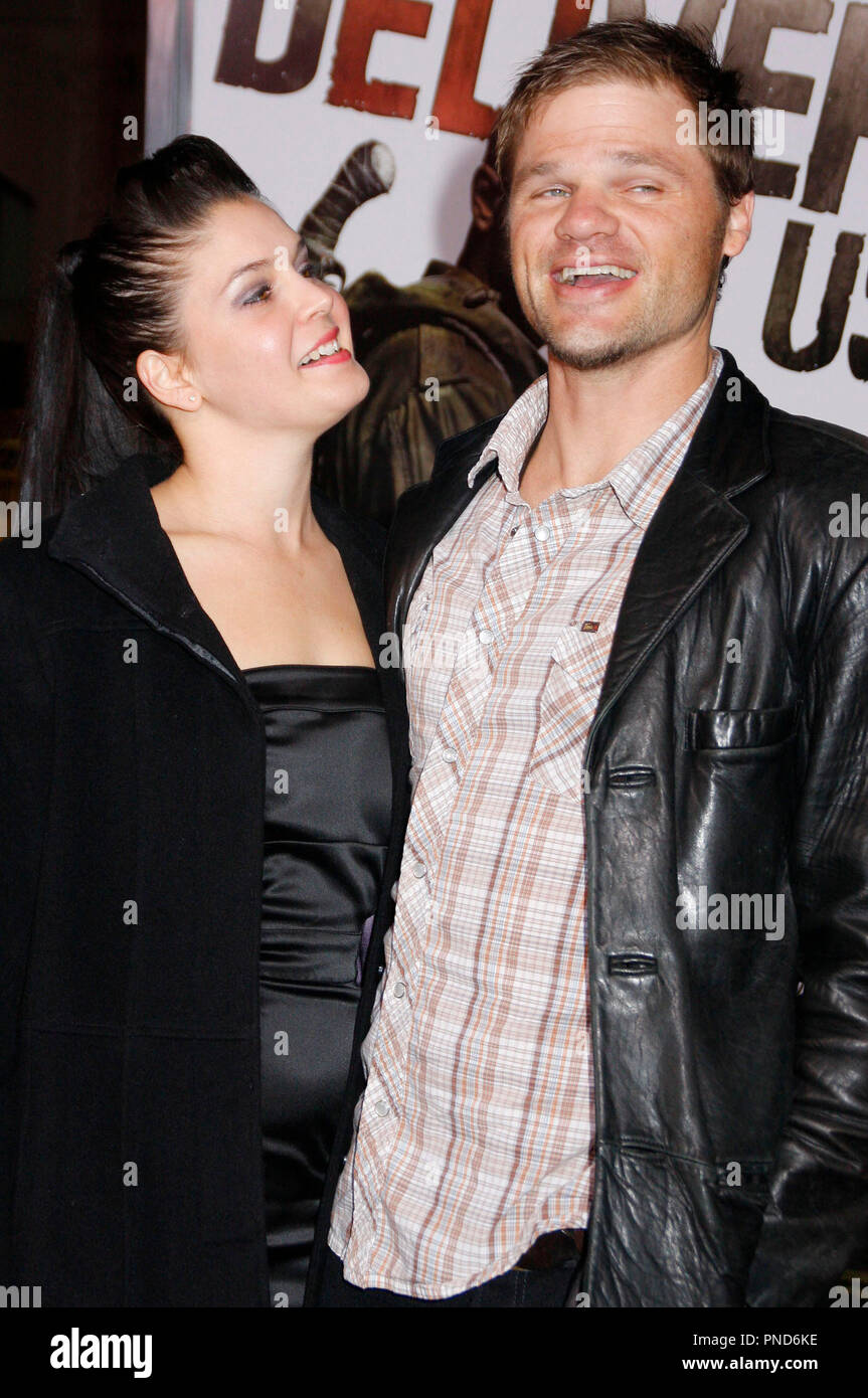 Evan Jones and guest at the Los Angeles Premiere of BOOK OF ELI held at ...