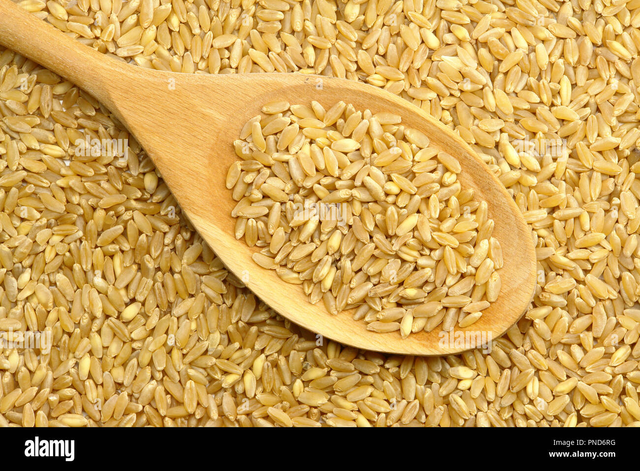 Wheat and wooden spoon Stock Photo - Alamy