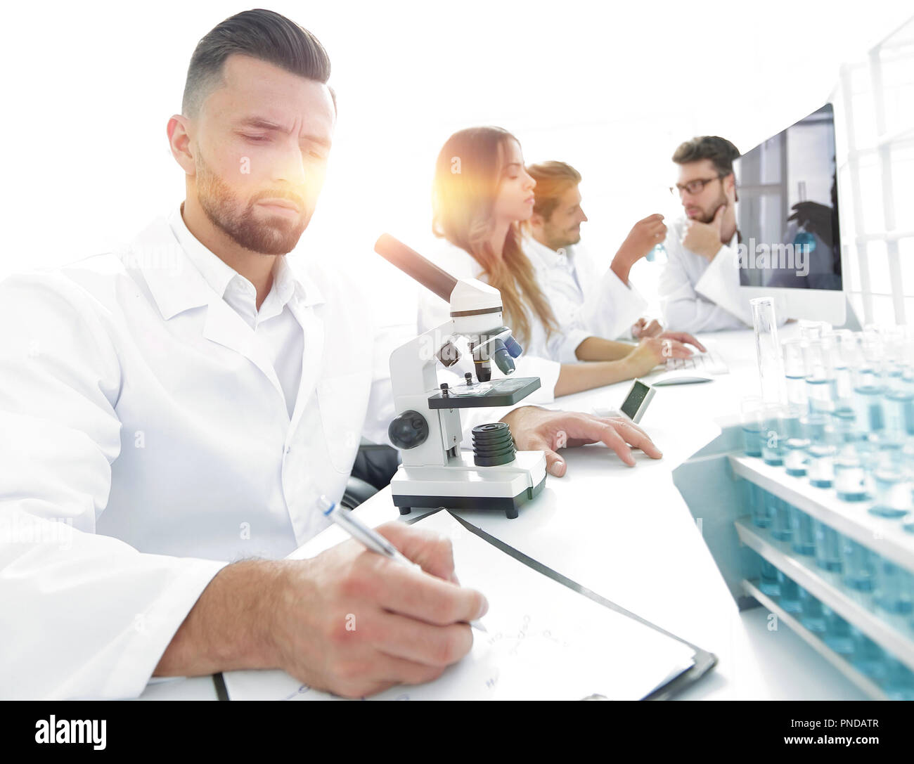 young scientist works in the lab.concept of teamwork Stock Photo - Alamy