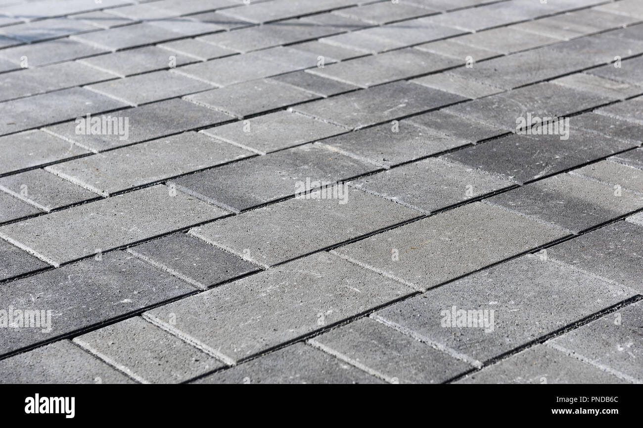 Concrete or cobble gray pavement slabs or stones for floor, wall or ...
