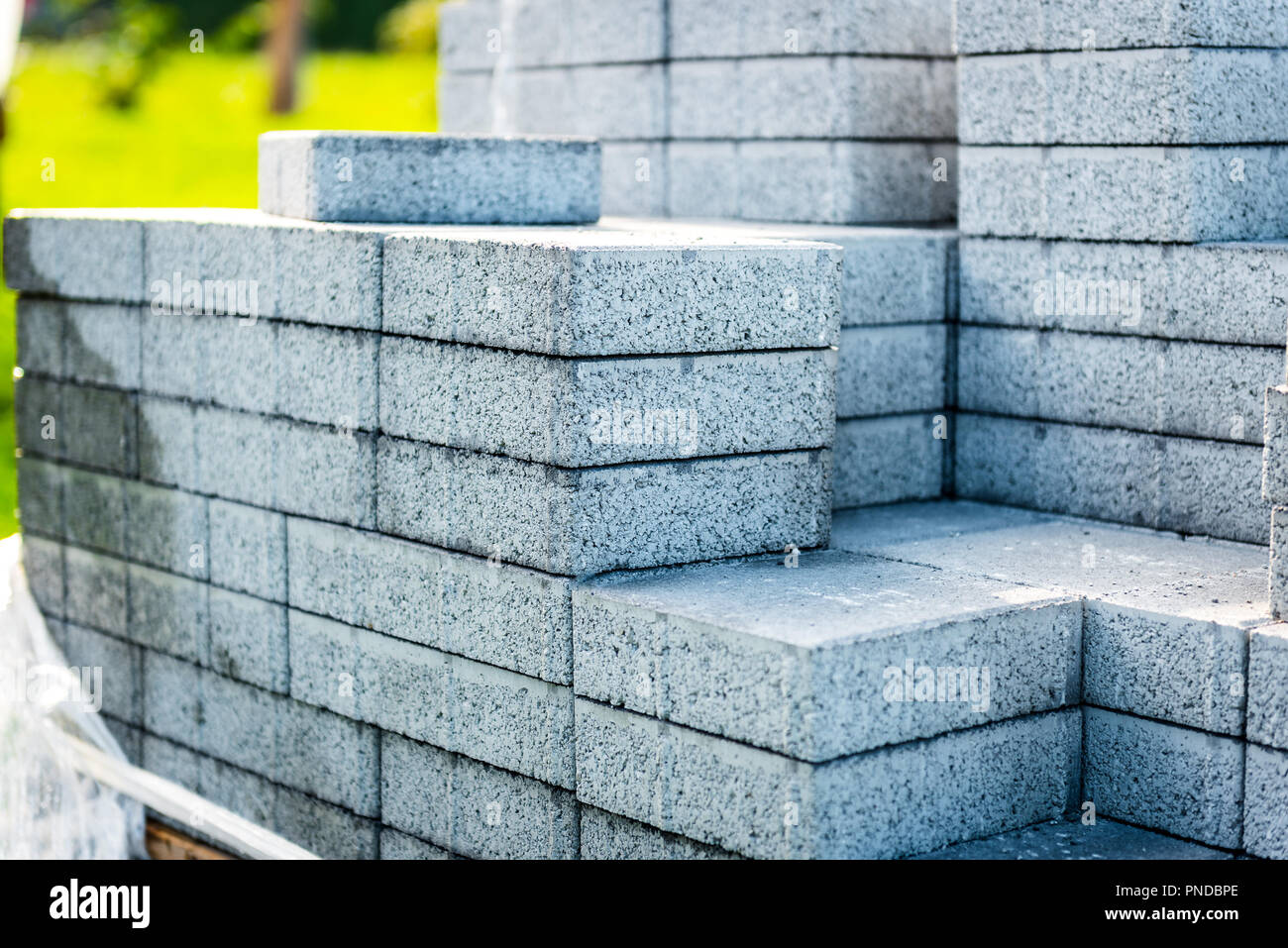 Stack of concrete paving slabs tiles ready for laying pavement ...