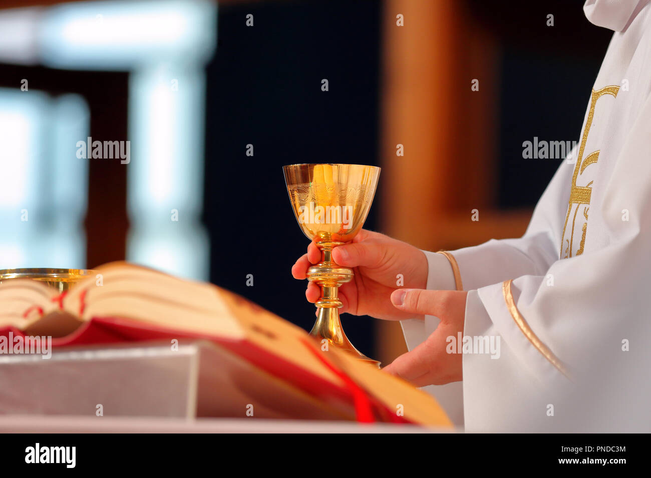 Priest celebrate mass at the church and empty place for text Stock ...