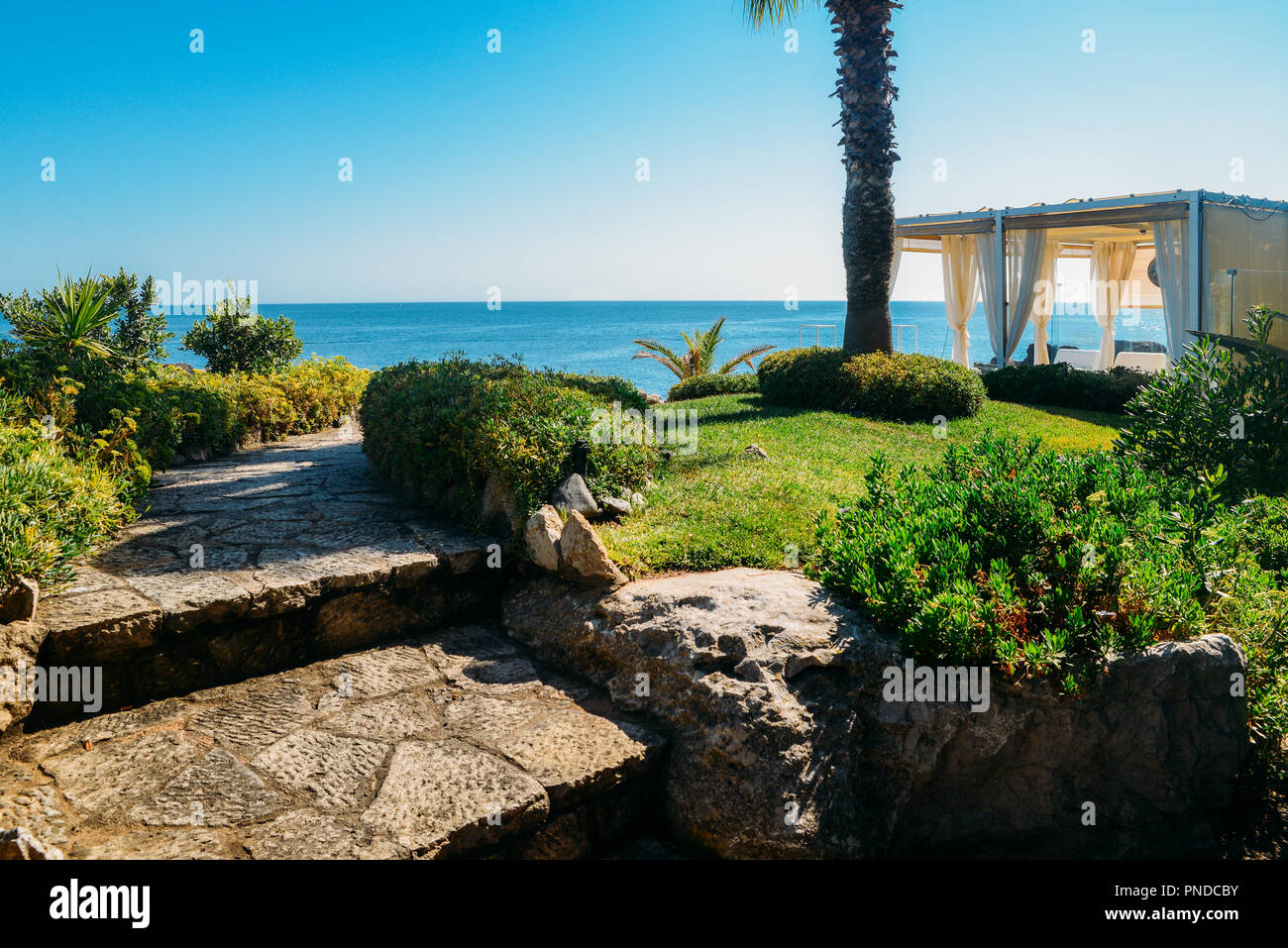 Sea view from summer cabana. Ocean view from beach tent. Holiday relax ...