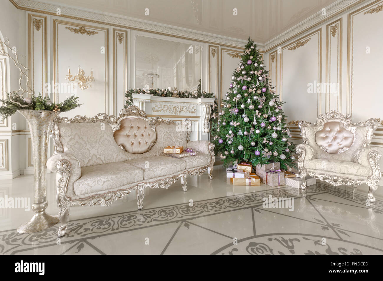 Christmas morning. classic luxurious apartments with a white fireplace ...