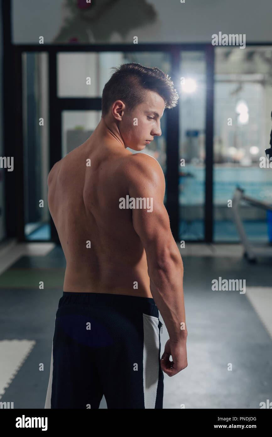Young and fit man at the gym Stock Photo - Alamy