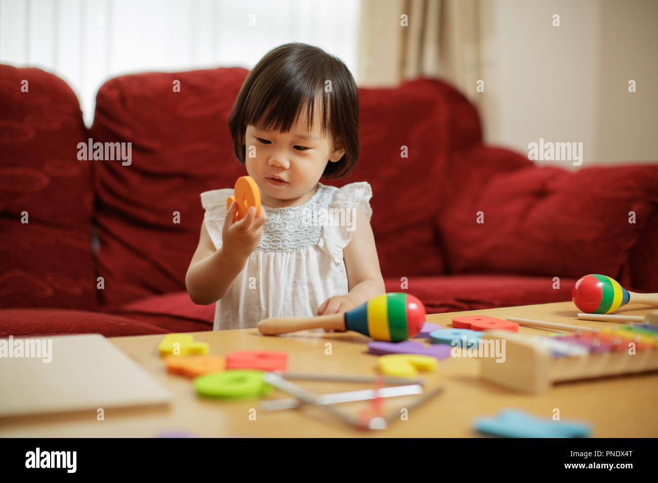 baby girl learning numbers at home Stock Photo - Alamy