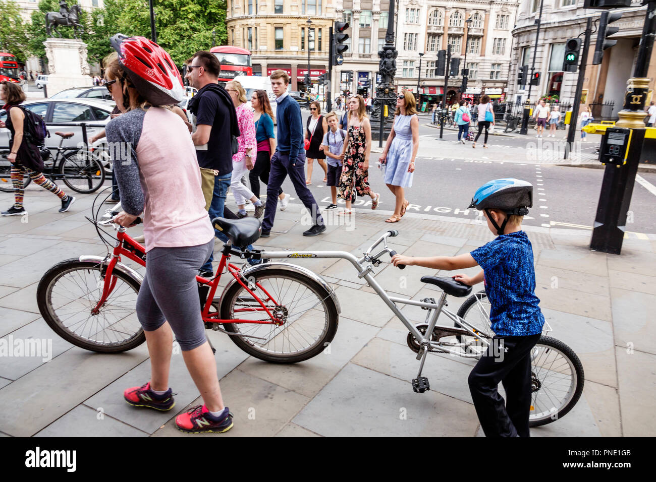 Mother and son riding bikes hi-res stock photography and images - Alamy
