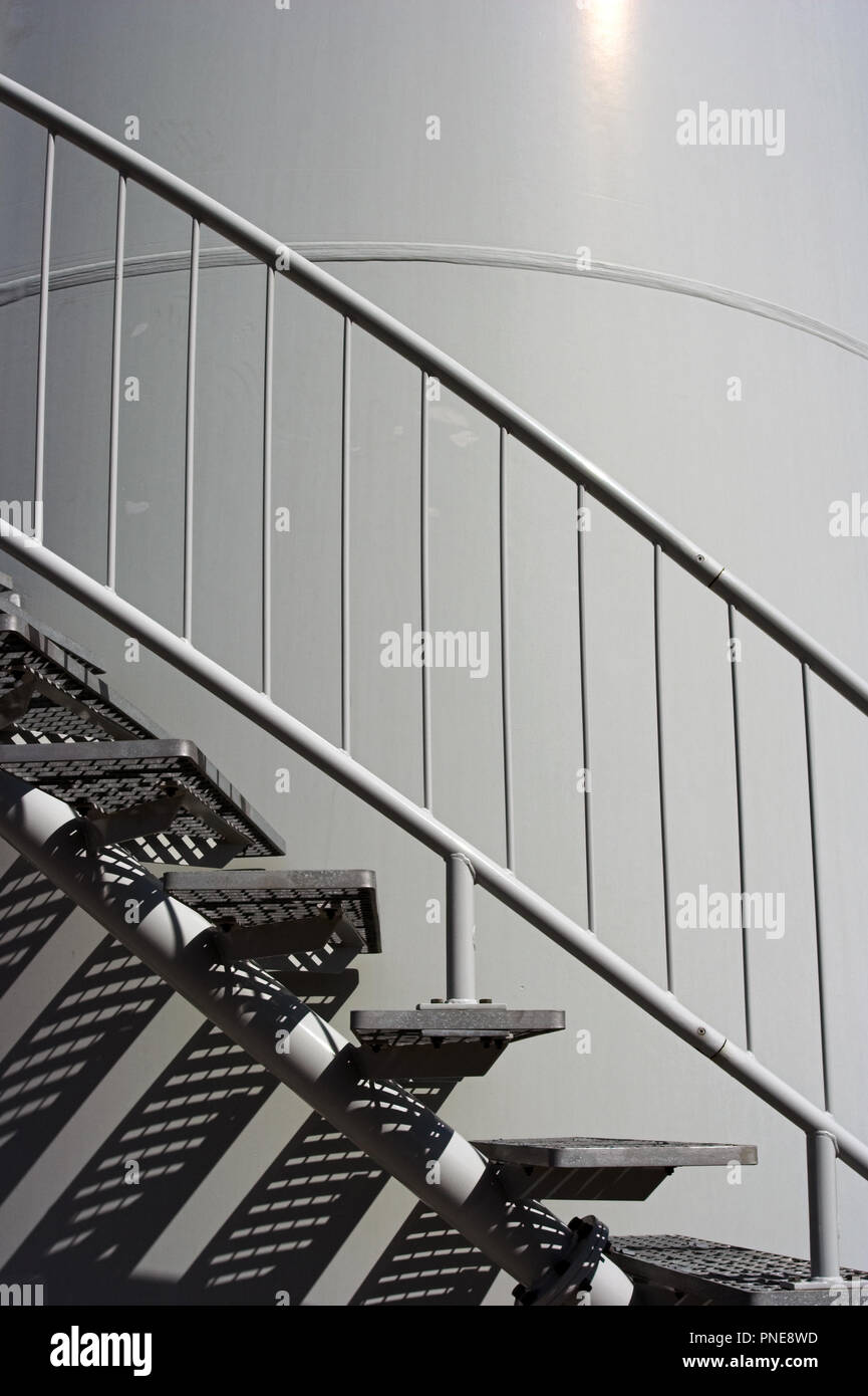 Metallic round stairs of an industrial complex Stock Photo - Alamy