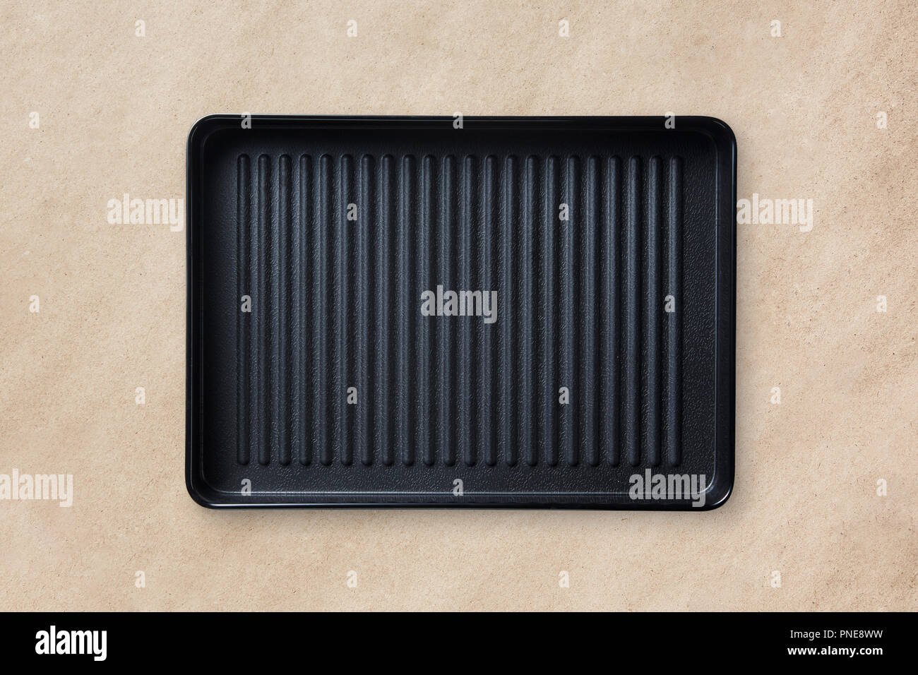 Kitchenware isolate on brown paper texture background Stock Photo - Alamy