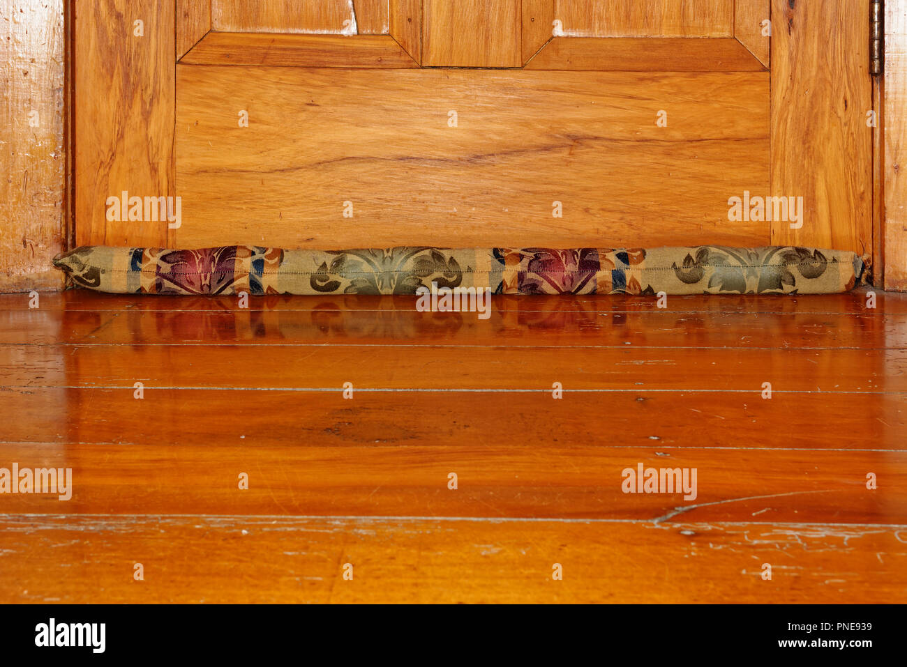 Draught excluder hi-res stock photography and images - Alamy