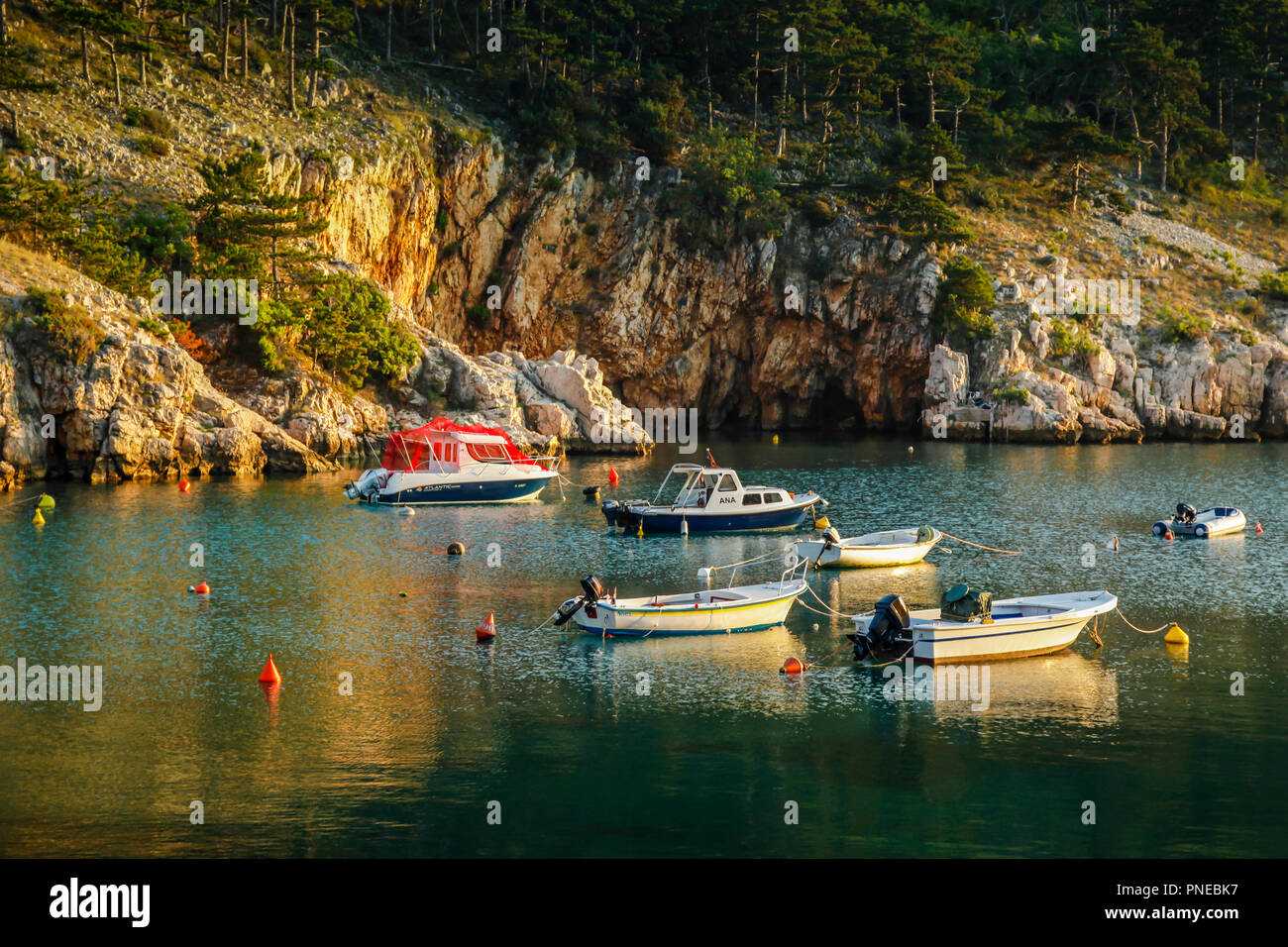 Small fishing boats on the old waterfront at Punat on the Croatian ...