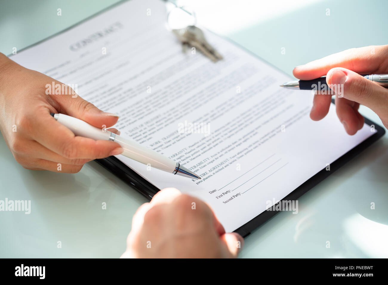 Two person filling form hi-res stock photography and images - Alamy