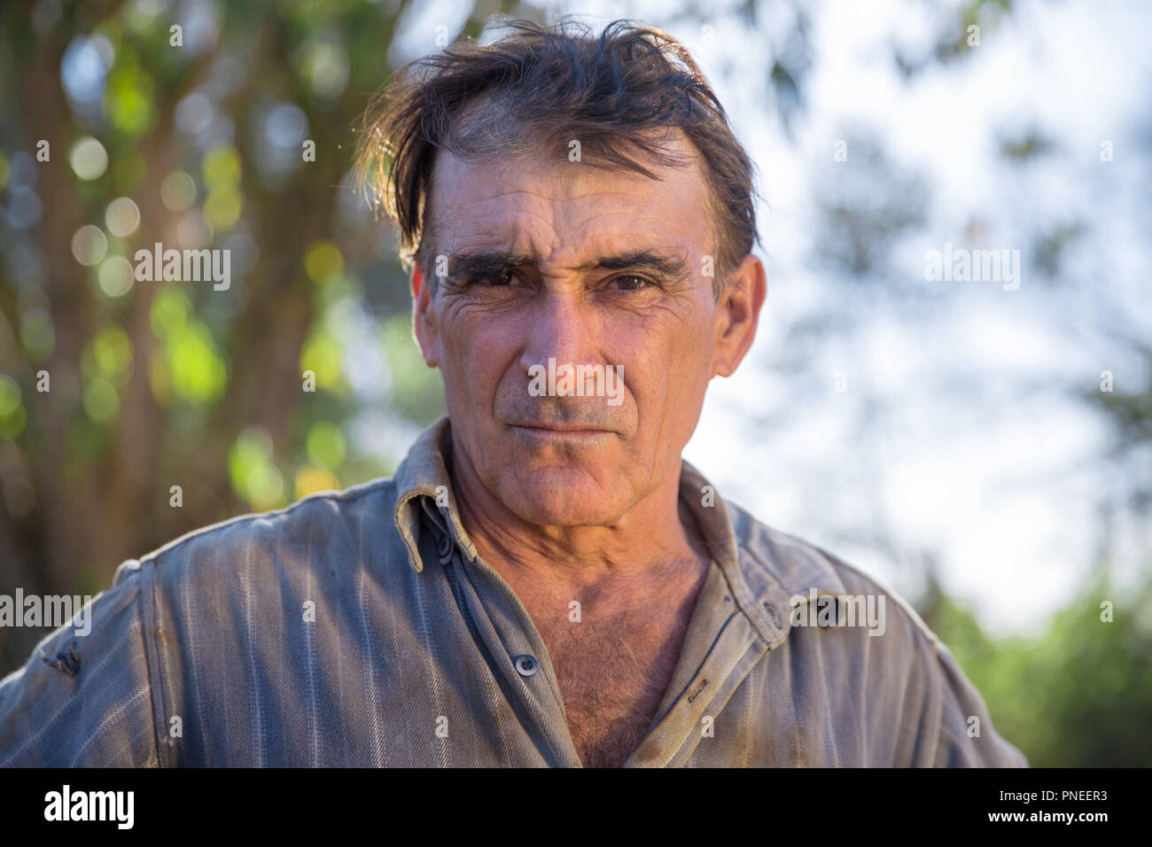 Farmer - Sad middle-aged man with wrinkles on his face Stock Photo - Alamy