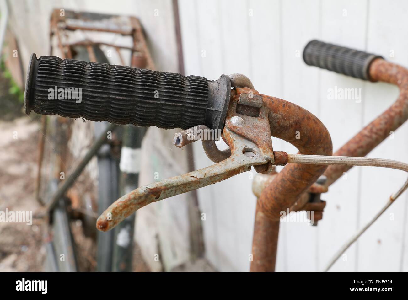 Bike Handle Antique Broken Old at decay and rust Stock Photo - Alamy