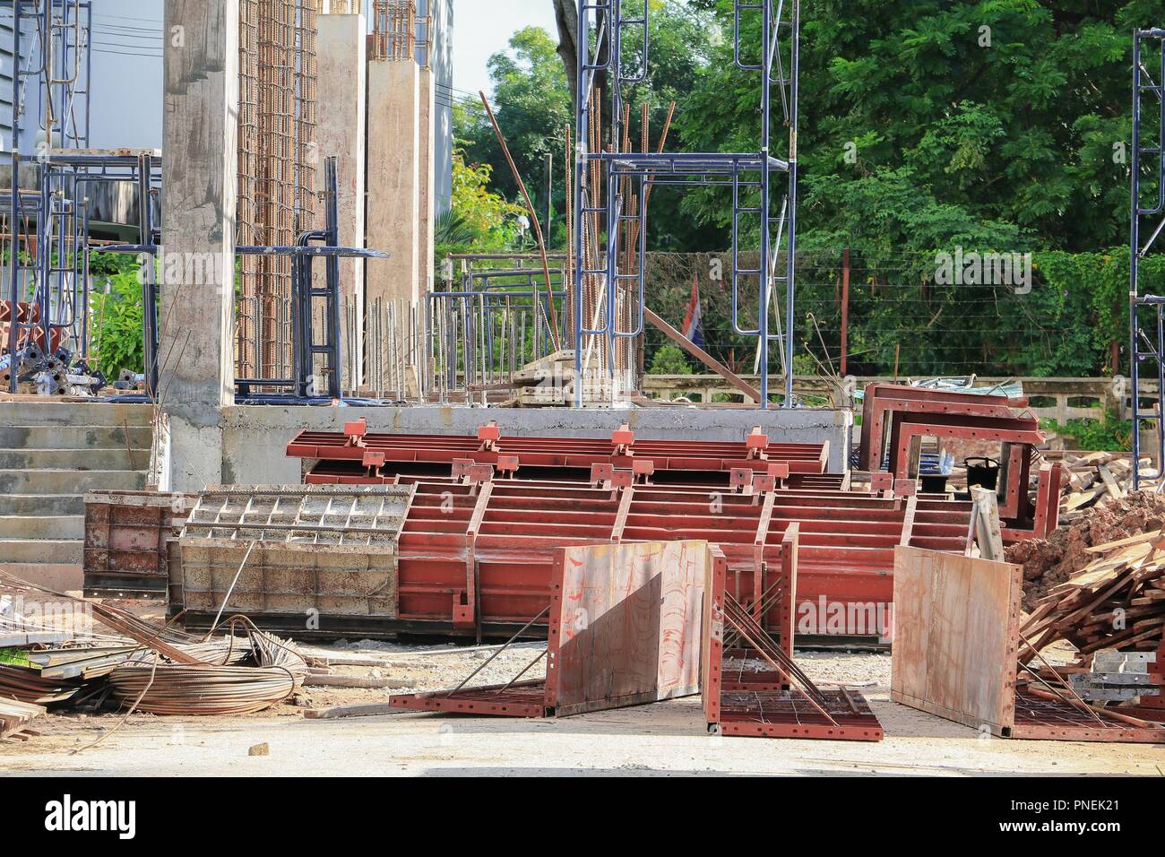 Construction work industry at building site Stock Photo - Alamy