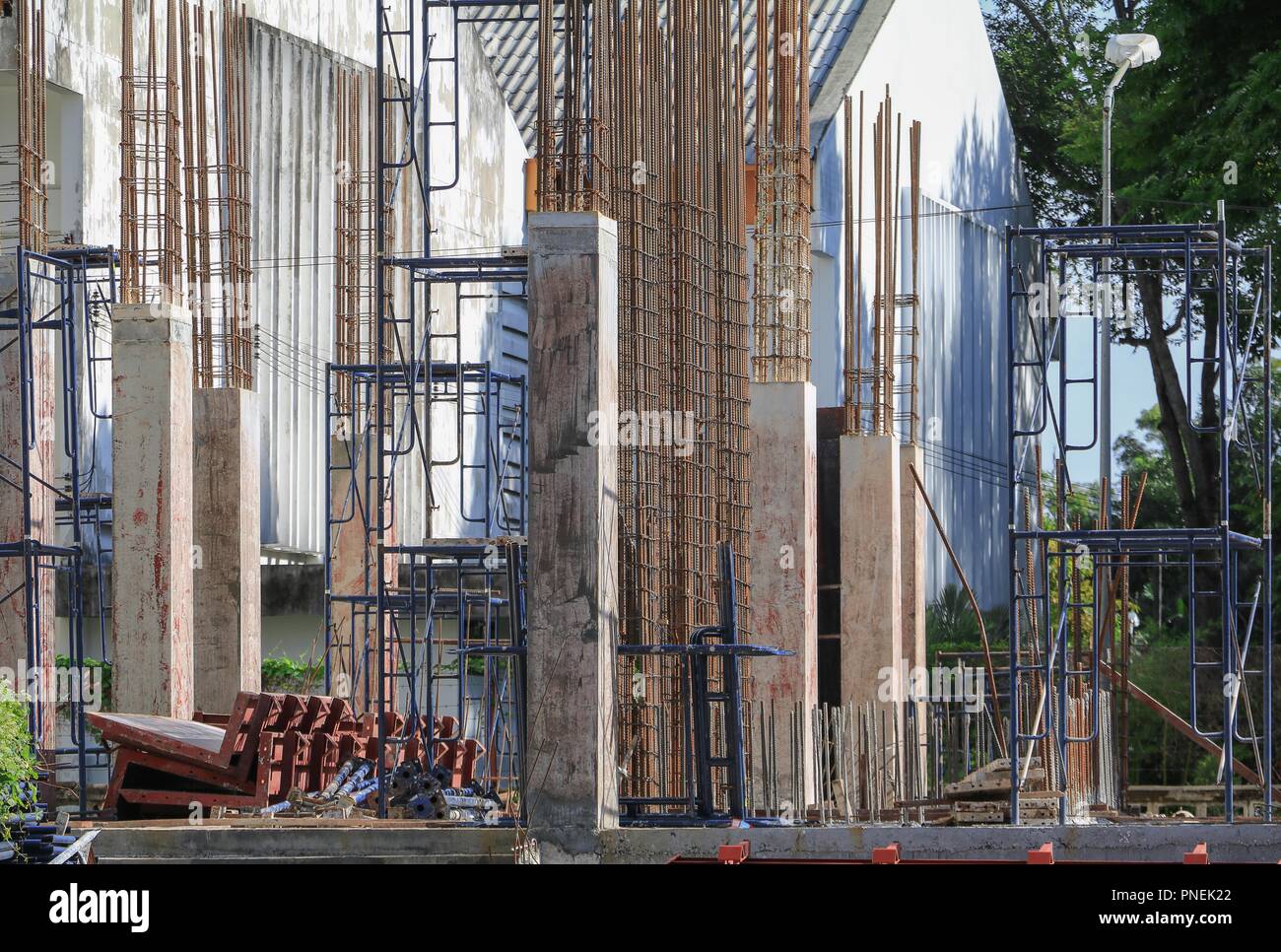 Construction work industry at building site Stock Photo - Alamy